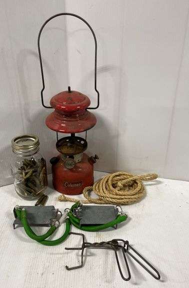Red Coleman lantern, for parts or repair; Pair of Arctic spurs, strap ...
