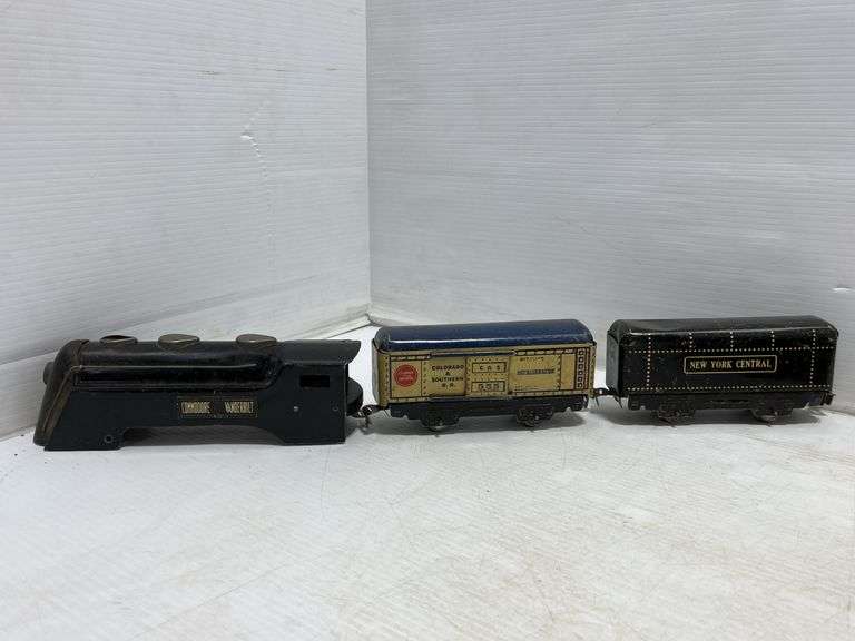 Marx tin train set, includes: Caboose, tanker, hopper, 2- Rock Island ...