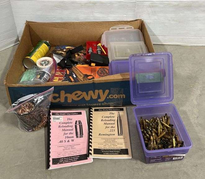 Box of .223 reloading equipment and manuals, dies, points, and remer ...
