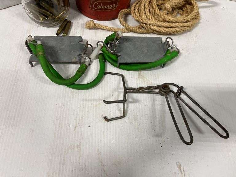 Red Coleman lantern, for parts or repair; Pair of Arctic spurs, strap ...