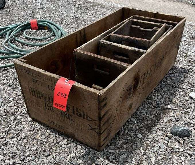 Older wood boxes with advertisements, includes: 1- Faygo, words are ...