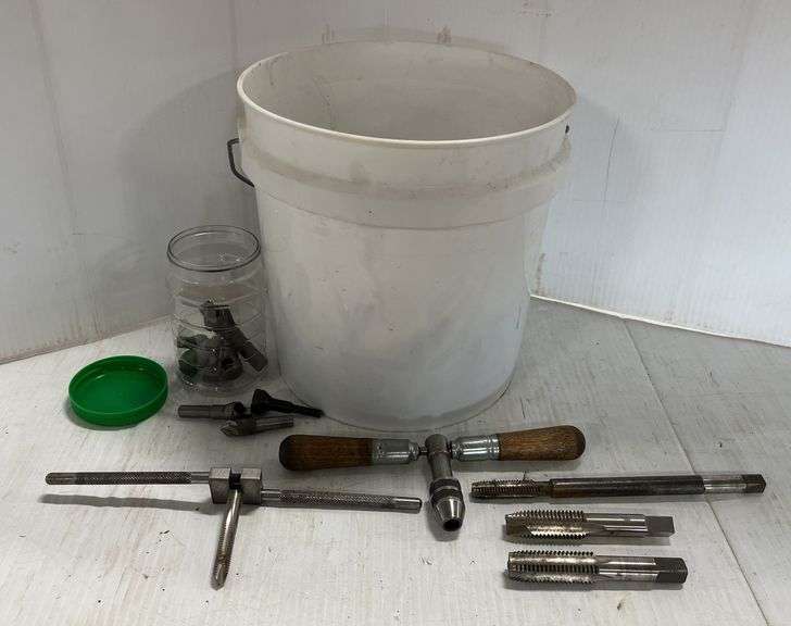 Bucket of taps, bucket- 9 1/2"H, used - Albrecht Auction Service