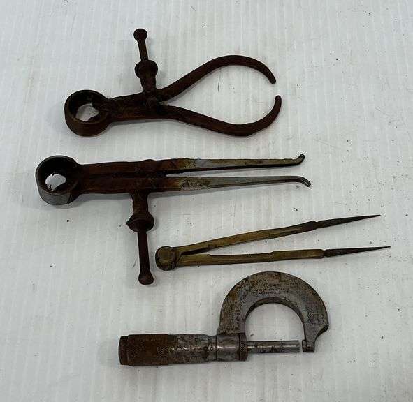 Older inside caliper, older outside caliper, dry point compass, and ...