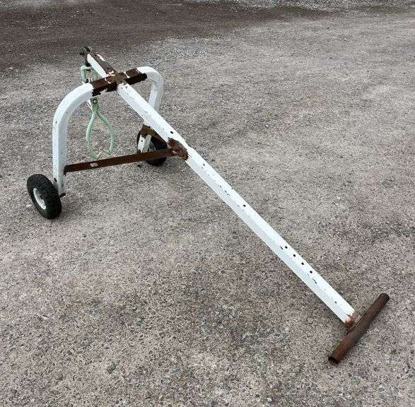 Homemade log roller with 14" hook, 76"W x 25"D x 30"H, tires low on air ...