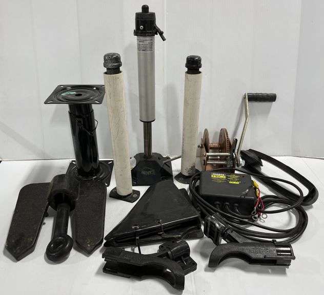 Box of boat parts: (2) Pole holders, (2) Seat pedestals, (2) Boat trail ...