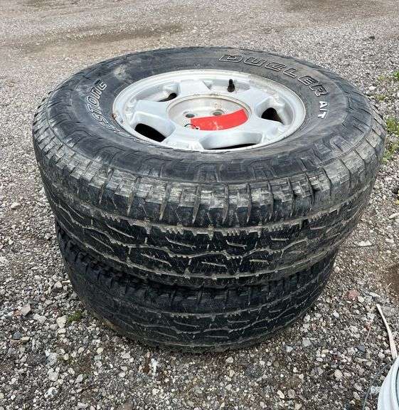(2) Bridgestone Dueler A/T tires, P265/75 R16 on aluminum rims, fits ...