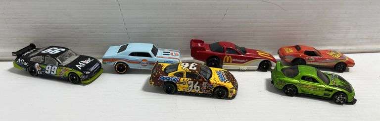 Advertising cars, include: Lucky Charms, McDonald's, Snickers, Aflac ...