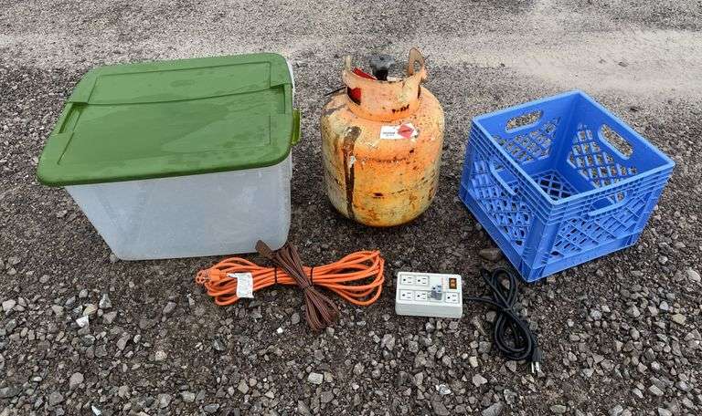 Propane tank in a new milk crate, possibly half full; Storage tub with ...