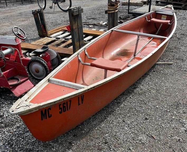 18' Canoe, orange in color - Albrecht Auction Service