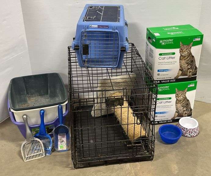 (2) 40 lb. boxes of cat litter, crate, carrying crate, (2) Litter boxes ...