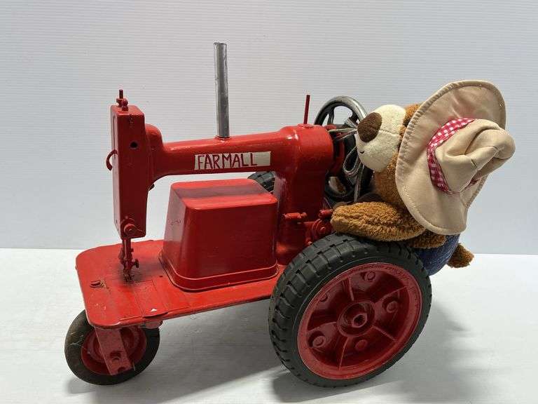 Singing bear tractor, 18"L x 17"H - Albrecht Auction Service