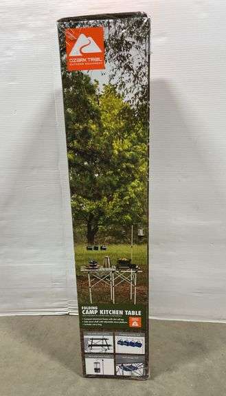 Ozark Trail, folding camp kitchen table, NIB - Albrecht Auction Service