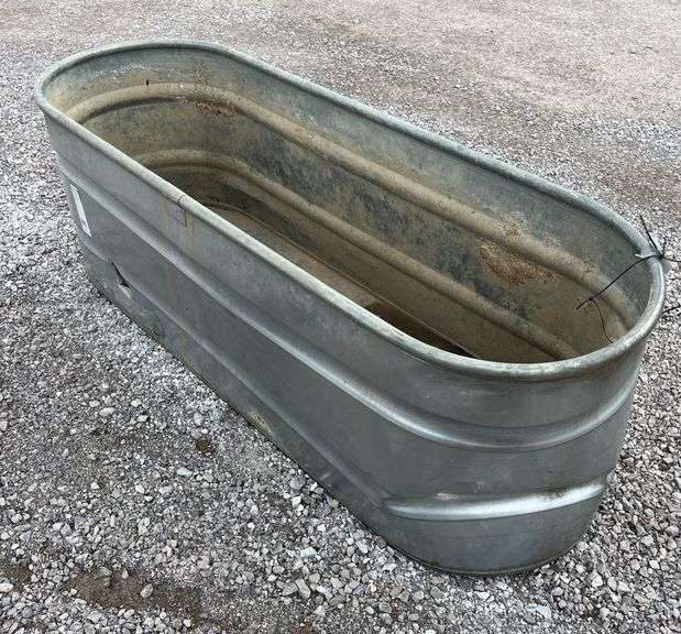 Countyline 170-gallon oval galvanized stock tank, 2' x 4', has holes ...