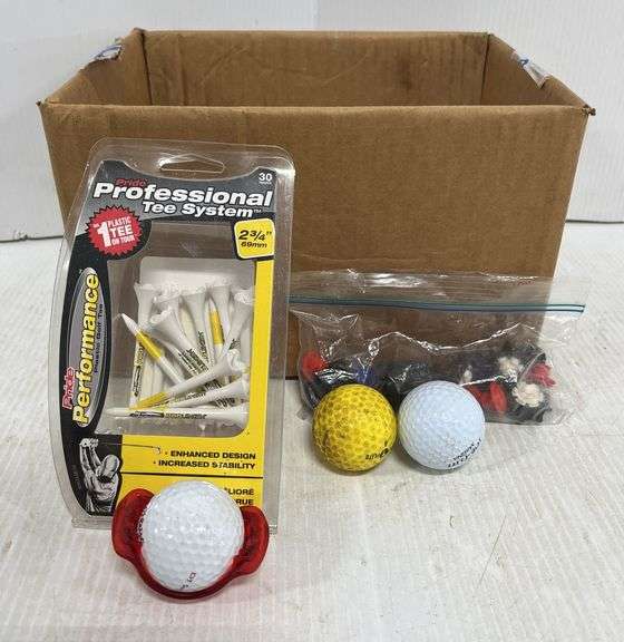 Box of golf items, includes: Golf balls, shoe spikes, tees, and ball ...
