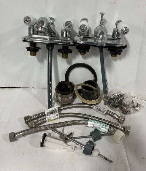 (2) Bathroom faucets with ceramic handles, 4" center holes, misc. parts ...