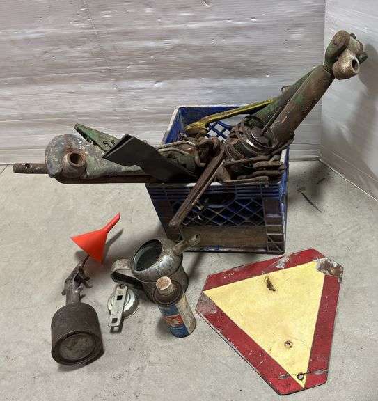 Tractor/lawn mower parts, includes: Oil cans, blades, safety triangle ...