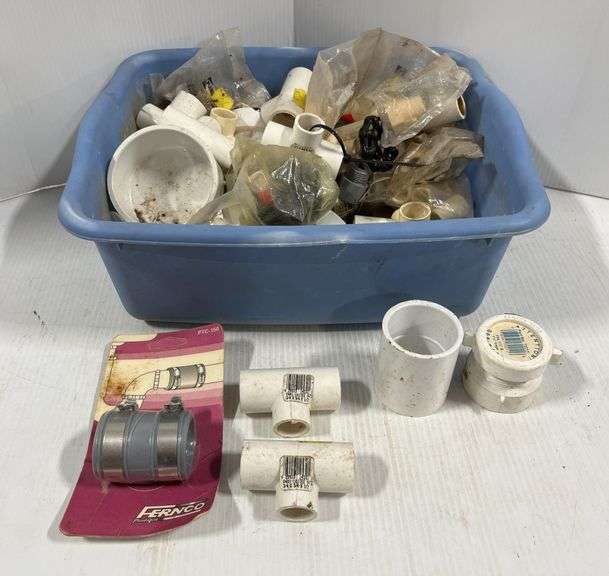 Small tote filled with new PVC and brass fittings, elbow parts, and ...