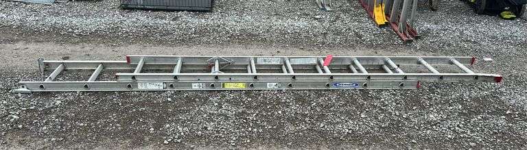 10' Aluminum extension ladder with 10' extension, has small dent but is ...