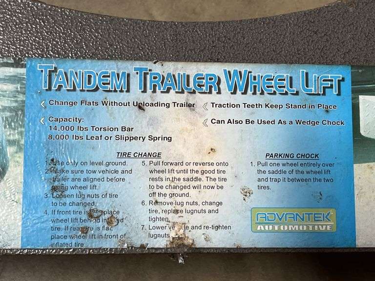 Metal trailer wheel lift, 32"W x 6"H, very nice - Albrecht Auction Service