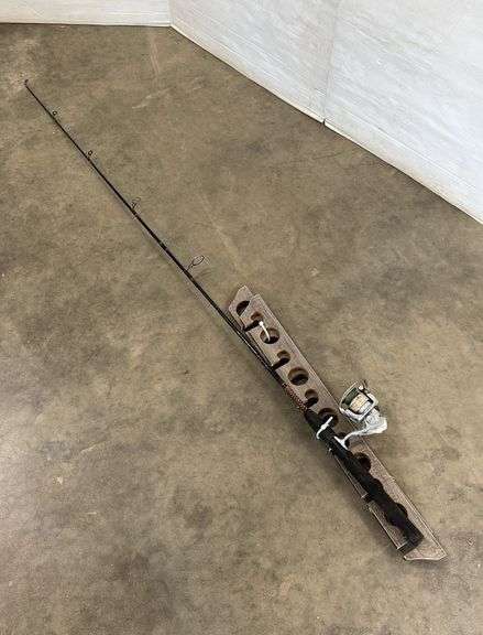 Shakespeare Ugly Stik fishing rod with Shimano 2500 FE reel and wall ...