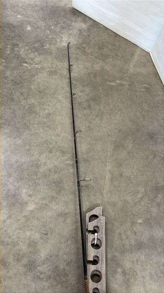 Shakespeare Ugly Stik fishing rod with Shimano 2500 FE reel and wall ...