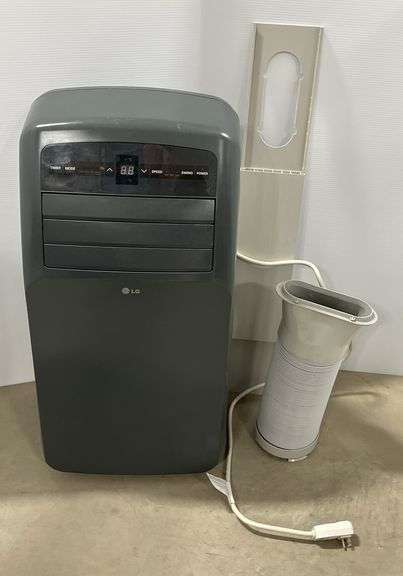 LG 1200 BTU room AC, 31"H, works - Albrecht Auction Service