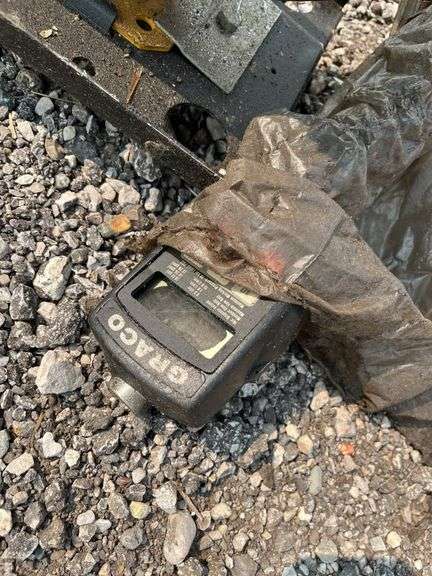 Graco digital oil gun and hose reel, used - Albrecht Auction Service