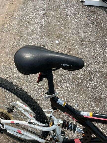 Next PX 6.0 12-speed bike, 26", has a flat tire - Albrecht Auction Service