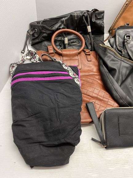 Purses and wallets, some used very little, includes: (9) Purses, (1 ...