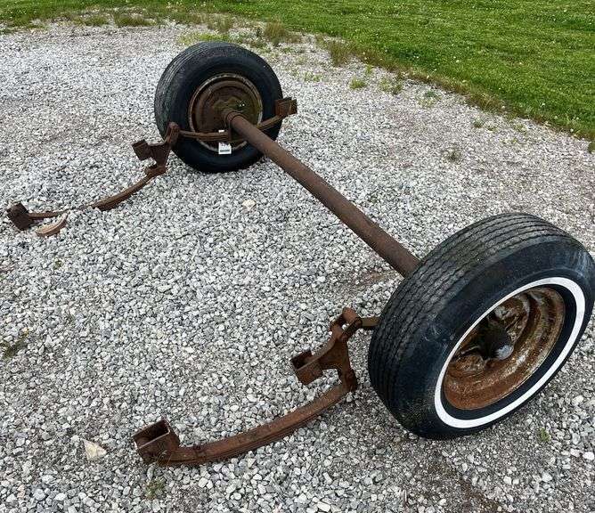 Trailer axle, 65" center of spring perch, 73" backing plate to backing ...