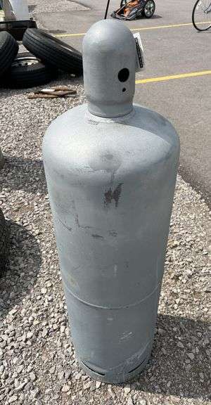 60 lb. propane tank, 45"H, full - Albrecht Auction Service