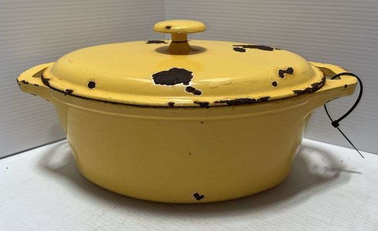 Cast iron yellow enamel dutch oven with lid, lid is chipped, by Innova ...