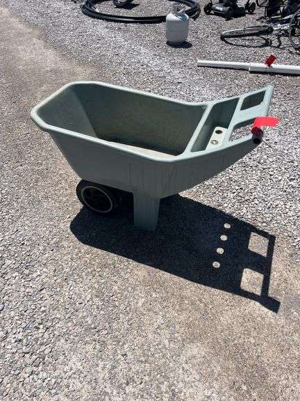 Plastic rolling 2-wheel lawn cart - Albrecht Auction Service