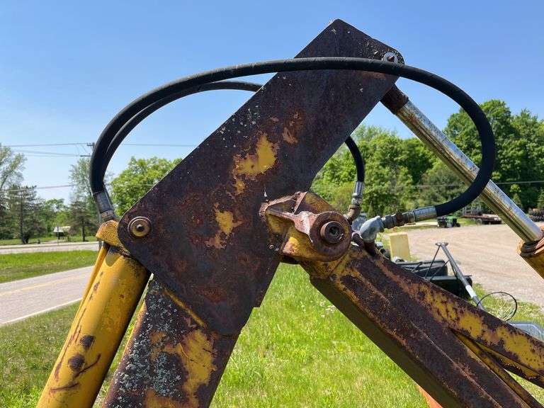 Tractor backhoe with PTO pump and reservoir, 18" bucket, will need some ...