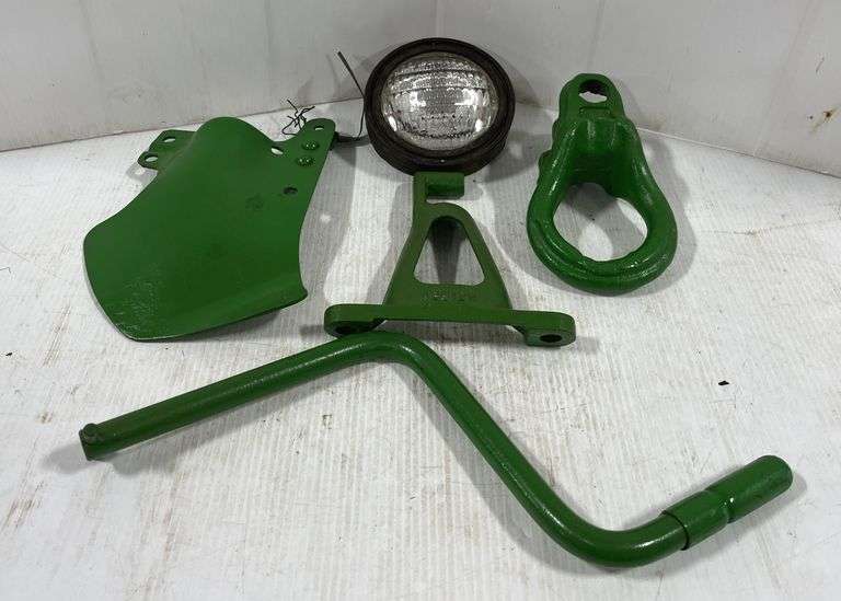 John Deere items, includes: Clevis, head light, hand crank (L-A), and a ...