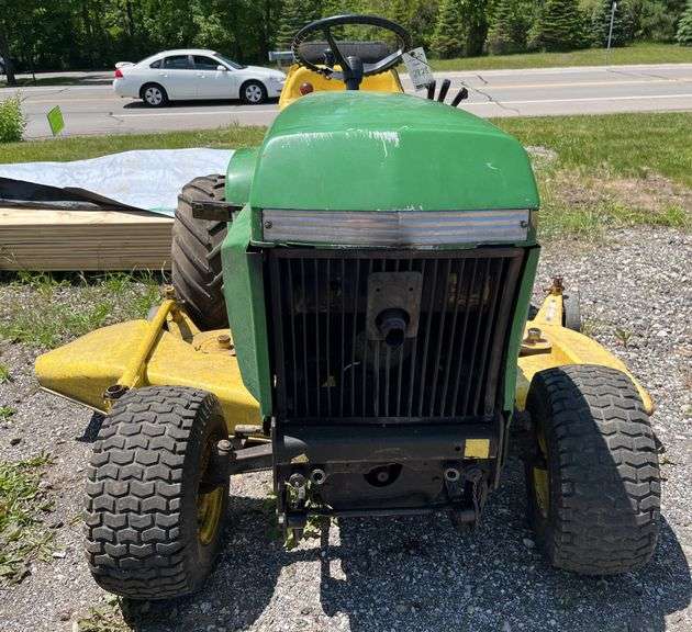 John Deere 400 garden tractor with a 60" mower deck, runs and drives ...