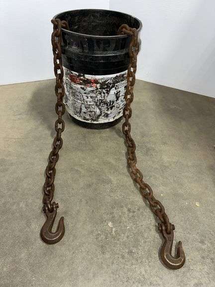Bucket filled with heavy logging chains - Albrecht Auction Service