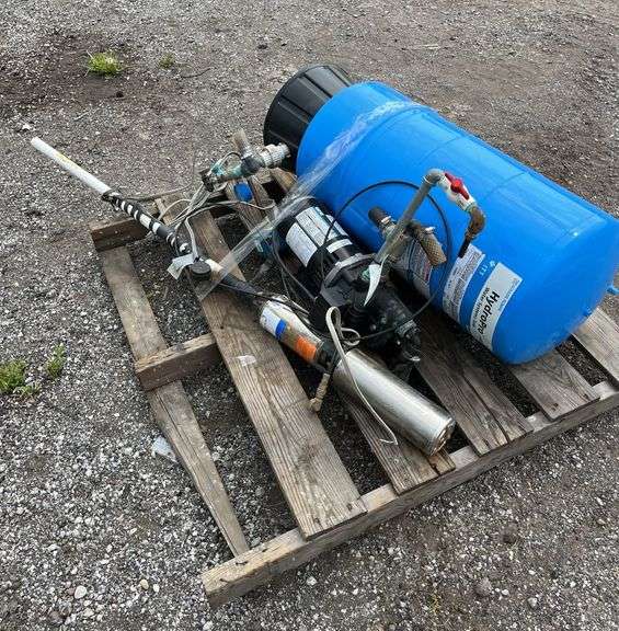 Pallet of well and plumbing supplies, includes: Bladder tank and ...