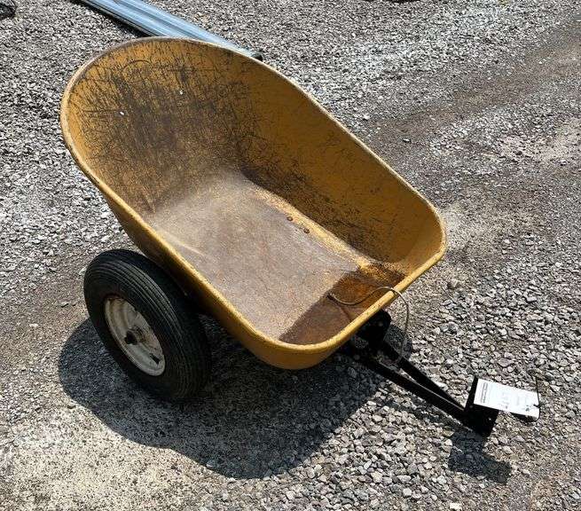 Older solid metal tow-behind wheelbarrow dump cart with two wheels, 27 ...