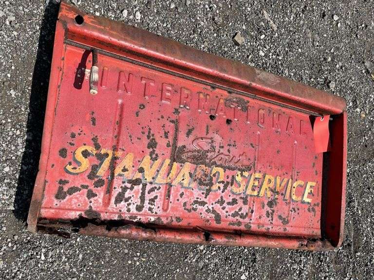1960s International Scout tailgate with standard service advertisement ...