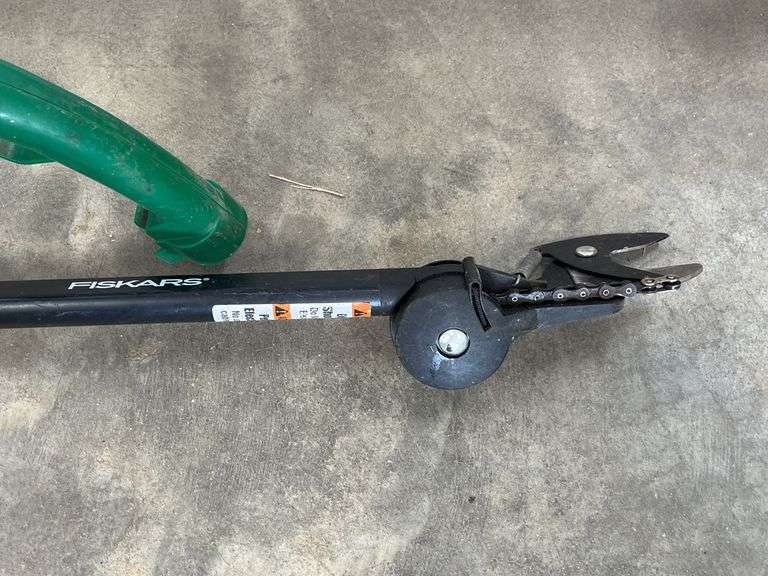 Fiskars pull cord tree trimmer; Black & Decker cordless garden tiller ...