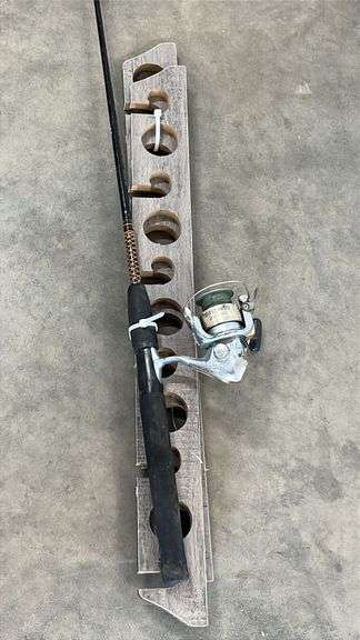 Shakespeare Ugly Stik fishing rod with Shimano 2500 FE reel and wall ...