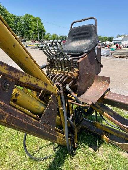 Tractor backhoe with PTO pump and reservoir, 18" bucket, will need some ...