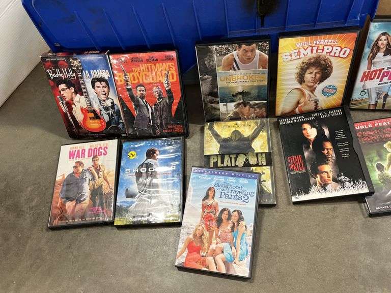 Various DVDs in a box and a tote, used - Albrecht Auction Service