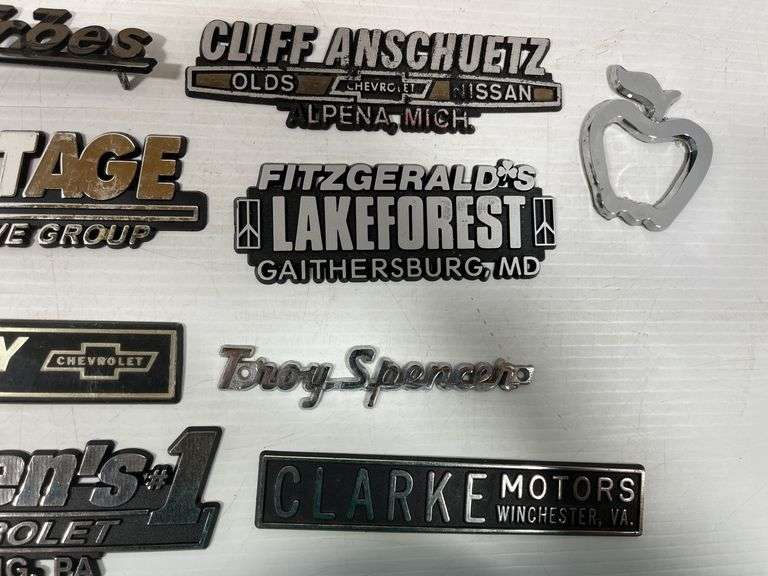 (35) Older die-cast and plastic automotive dealership emblems, some new ...