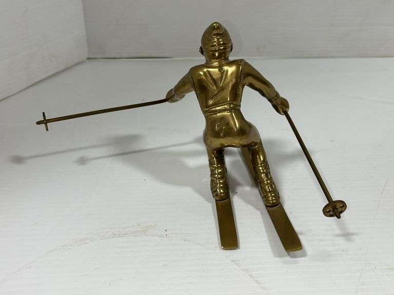 Older solid brass downhill skier, 5 1/2"H - Albrecht Auction Service