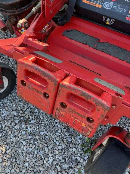 eXmark 52" zero-turn mower with Ultra Vac bagger system that dumps from ...