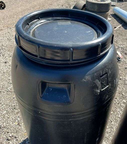 (2) Large plastic barrels with lids, 20"Dia x 46"H - Albrecht Auction ...