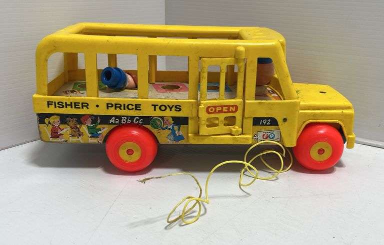 Older Fisher Price school bus with Weeble people, 12 1/2"L, fair ...