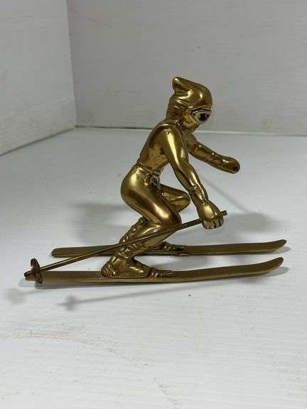 Older solid brass downhill skier, 5 1/2"H - Albrecht Auction Service